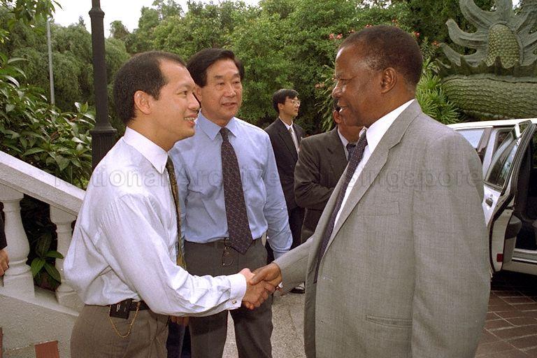 President of Botswana Sir Ketumile Masire being greeted by
