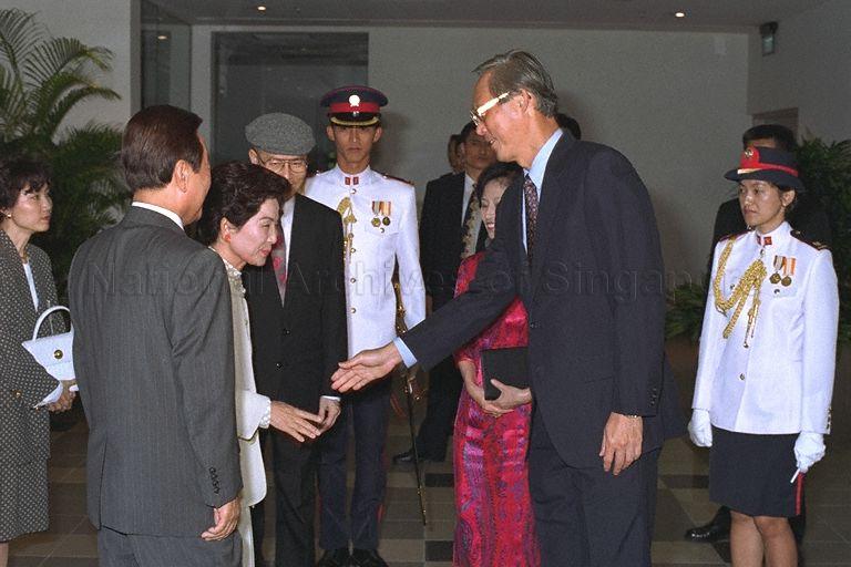 Prime Minister Goh Chok Tong greeting wife of South Korea's