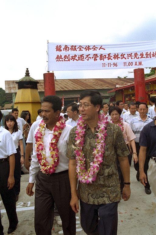 Minister without Portfolio Lim Boon Heng (right) and