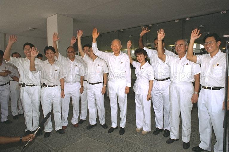 People's Action Party (PAP) candidates, from left, Lim Swee