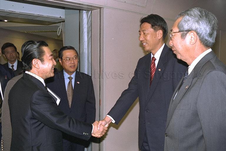 Prime Minister of Japan Ryutaro Hashimoto (left) being met