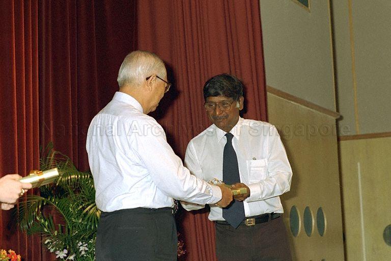 Minister for Finance Dr Richard Hu Tsu Tau (back to camera)