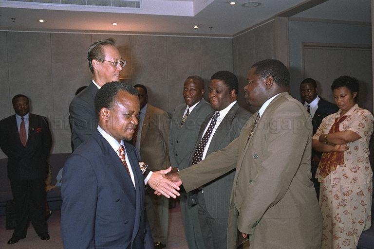 Zambian President Frederick Chiluba introducing a member of