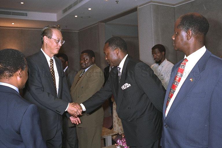 Zambian President Frederick Chiluba introducing a member of