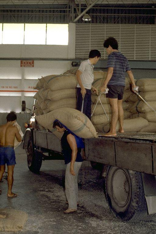 UNLOADING RICE