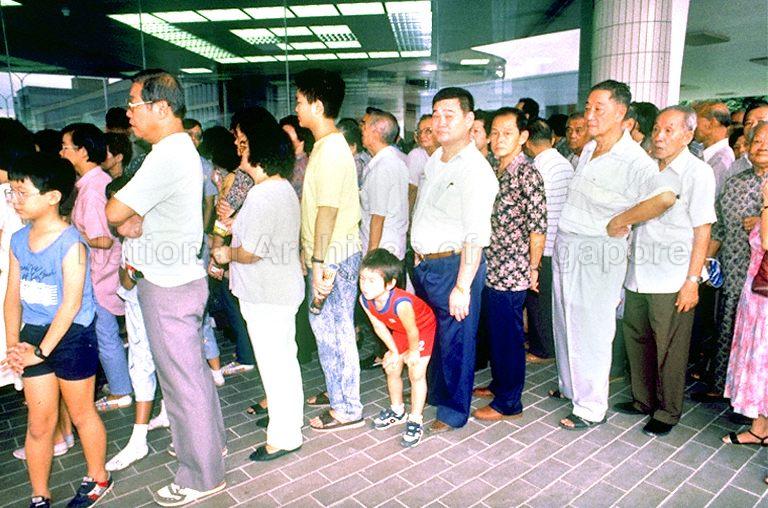 Commuters queueing up for the train ride during official