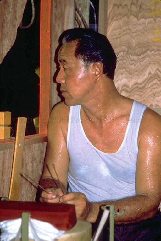 View of Chinese wayang (opera) musician at the back stage