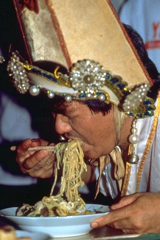 Medium (tangki) in a trance during ritual at Taoist temple