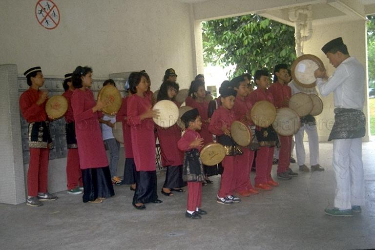 A kompang (frame drum) performance during Malay wedding at