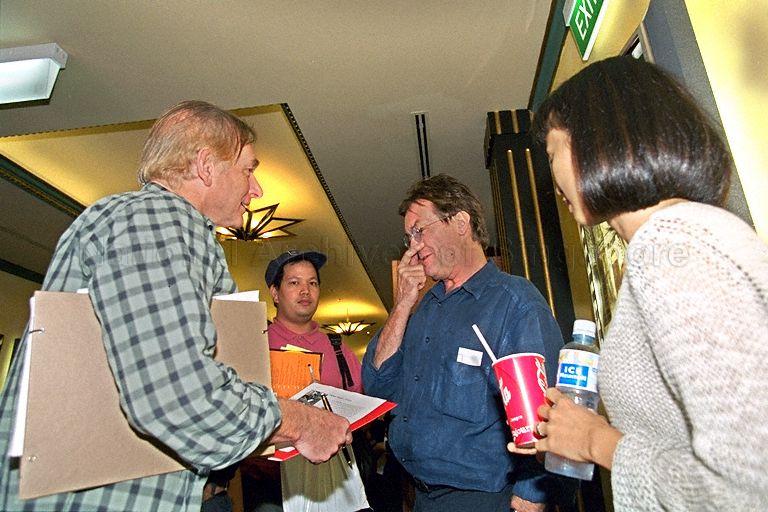 Australian director Peter Weir (left) talking to
