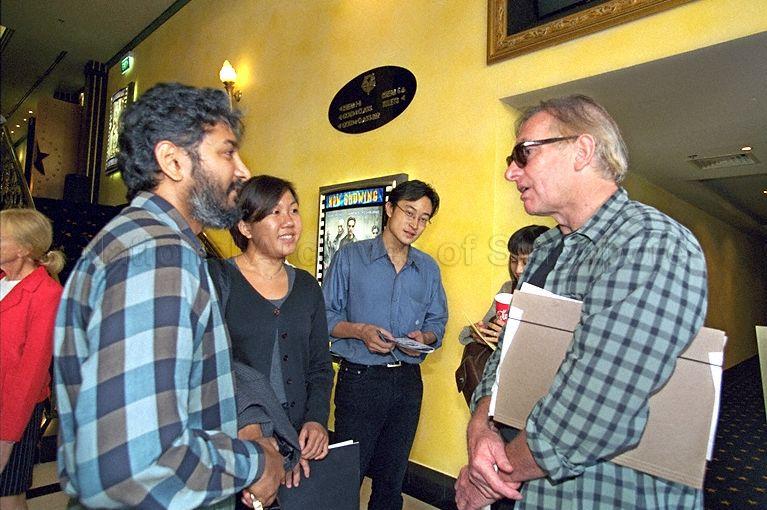 Australian director Peter Weir (right) talking to