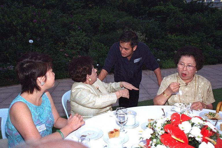 Mrs S R Nathan, wife of President, with guest at President's