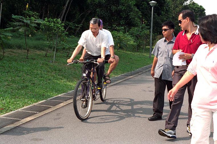Minister for Manpower Dr Lee Boon Yang cycling on a two-