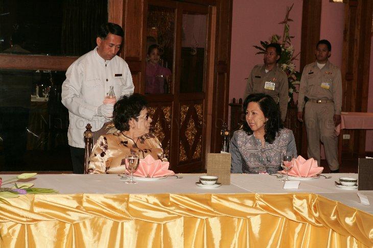PICTURE SHOWS MRS S R NATHAN (LEFT) WITH A THAI OFFICIAL AT