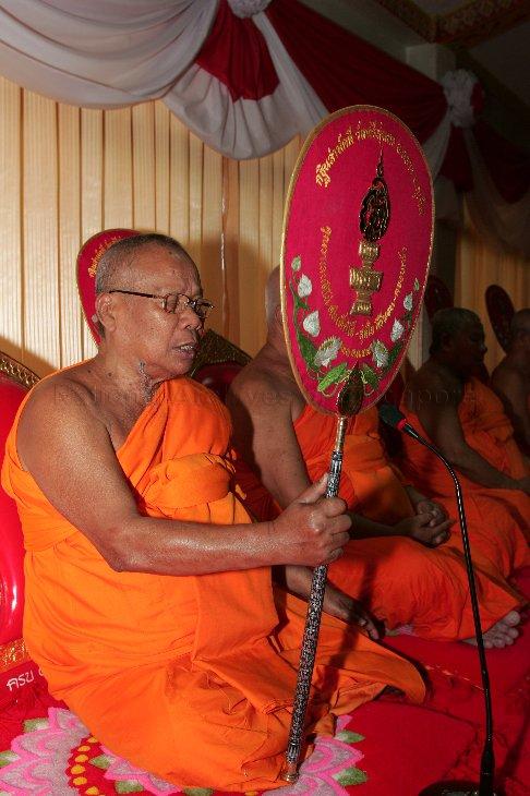 PICTURE SHOWS MONK PERFORMING THE BUDDHIST CEREMONIAL RITES