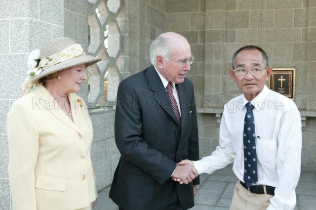Picture shows Australian PM John Howard thanking an official