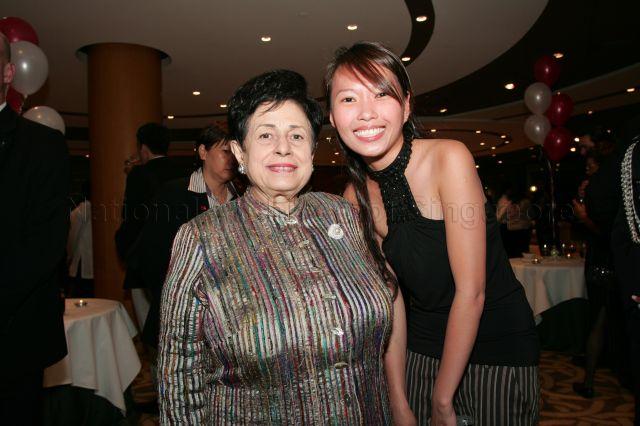 Group photograph of Mrs S R Nathan with guest at cocktail