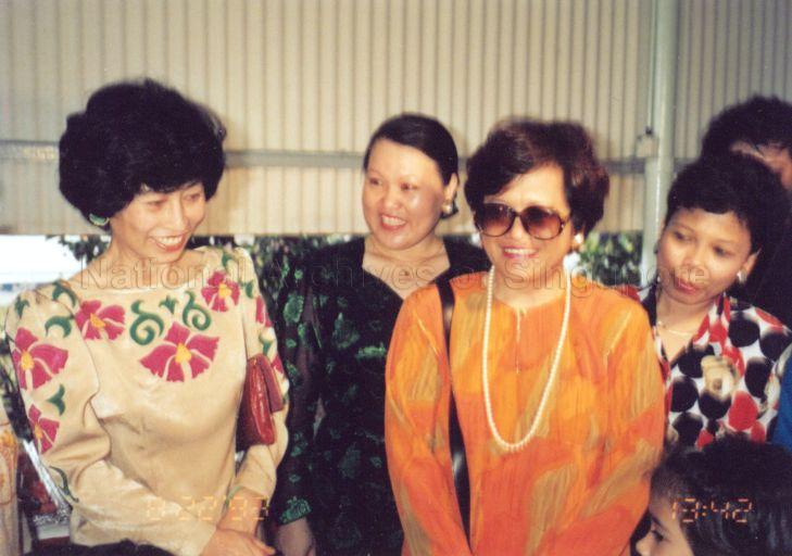 MRS ONG (LEFT), WIFE OF DEPUTY PRIME MINISTER AND MEMBER OF