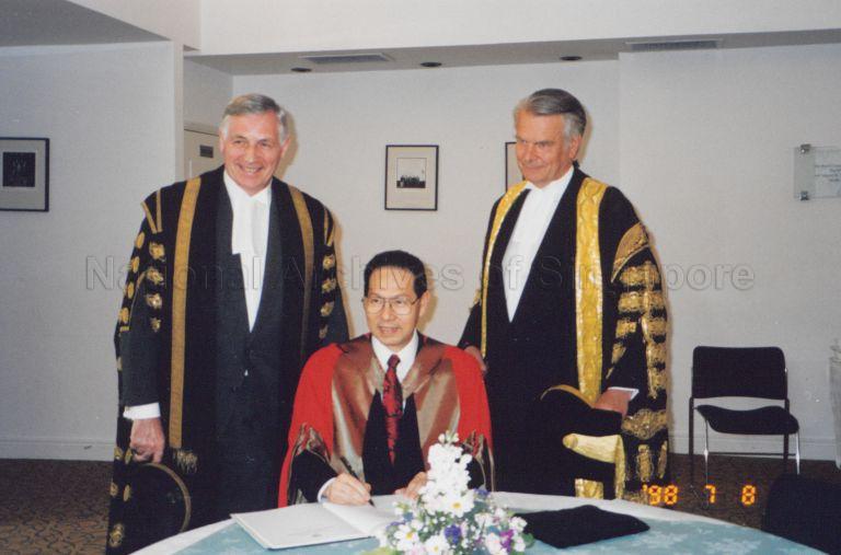 TWO UNIVERSITY OF LIVERPOOL PROFESSORS WITNESSING PRESIDENT