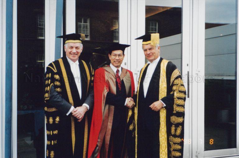 TWO UNIVERSITY OF LIVERPOOL PROFESSORS POSING WITH PRESIDENT