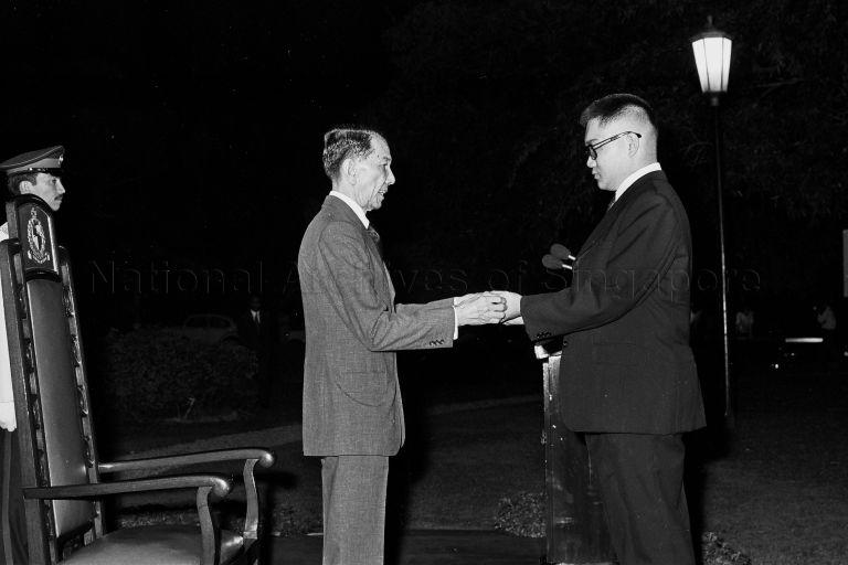 PRESIDENT BENJAMIN SHEARES PRESENTING THE PRESIDENT'S