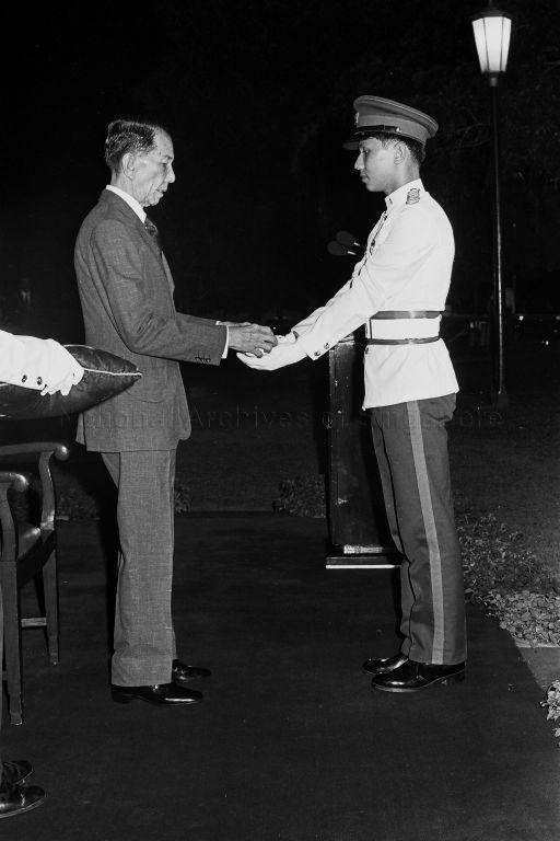 PRESIDENT BENJAMIN SHEARES PRESENTING THE PRESIDENT'S