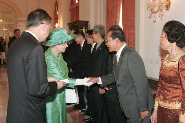 Queen Elizabeth II going through a receiving line of