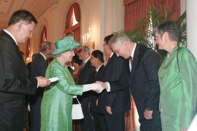 Queen Elizabeth II going through a receiving line of
