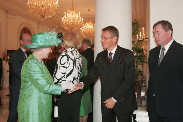 Queen Elizabeth II going through a receiving line of