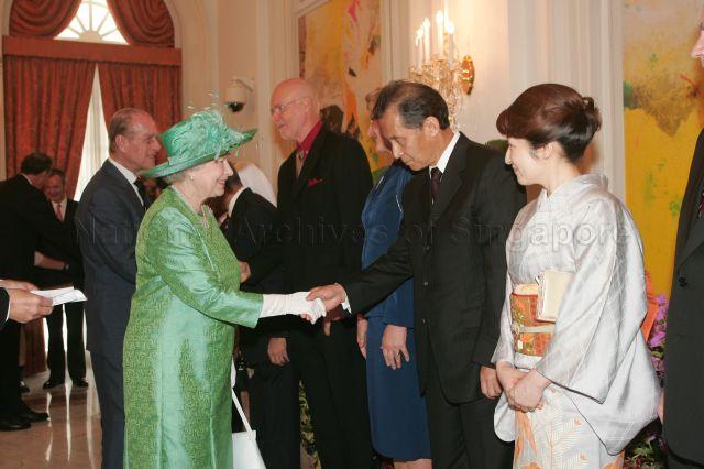 Queen Elizabeth II going through a receiving line of