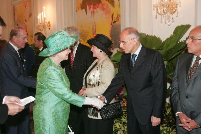 Queen Elizabeth II going through a receiving line of