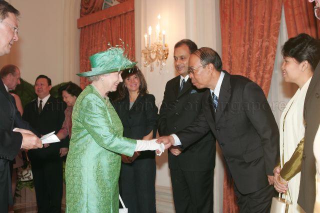 Queen Elizabeth II going through a receiving line of