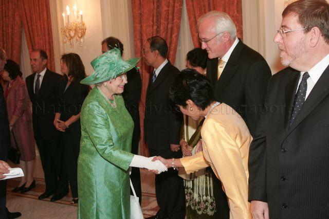 Queen Elizabeth II going through a receiving line of