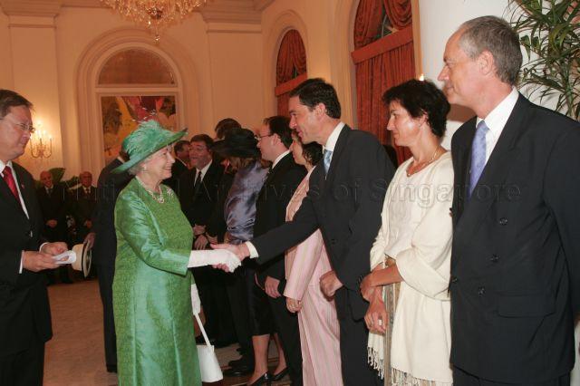 Queen Elizabeth II going through a receiving line of