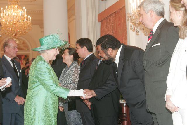 Queen Elizabeth II going through a receiving line of