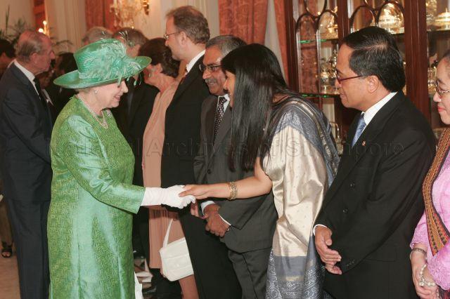 Queen Elizabeth II going through a receiving line of