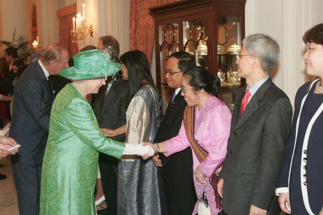 Queen Elizabeth II going through a receiving line of