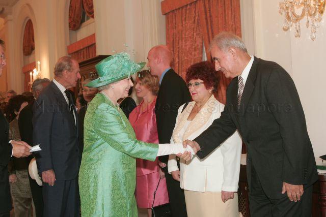 Queen Elizabeth II going through a receiving line of