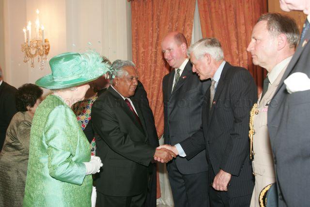 Queen Elizabeth II going through a receiving line of