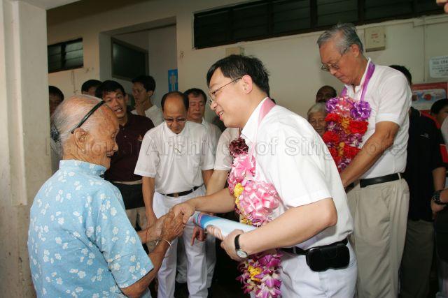 Taken at: Senior Minister Goh Chok Tong's visit to Block 10