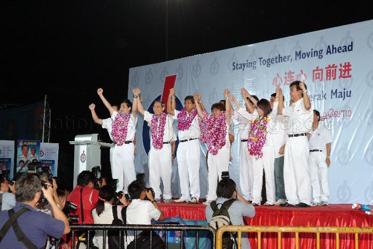 People's Action Party (PAP) candidates (garlanded) for Jalan