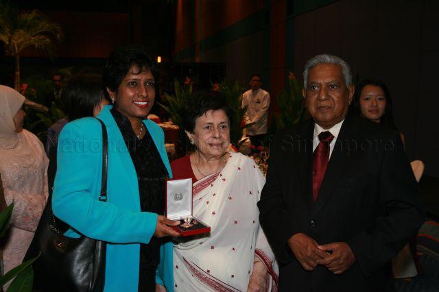 President and Mrs S R Nathan posing for photographs with
