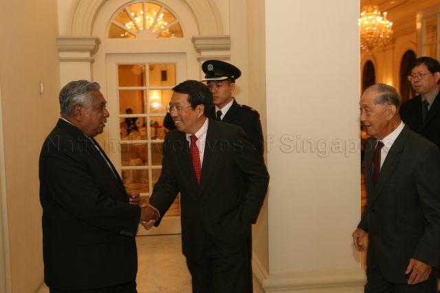 Guest of honour, President S R Nathan, exchanging greetings