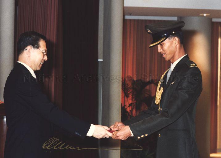 President Ong Teng Cheong presenting letter of appointment