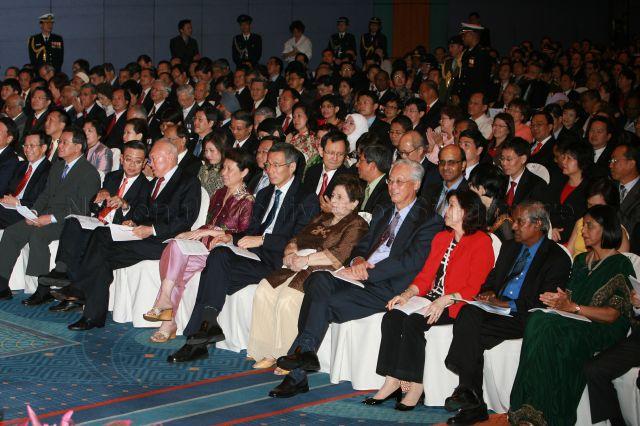 Mrs S R Nathan, wife of President, with (front row, from