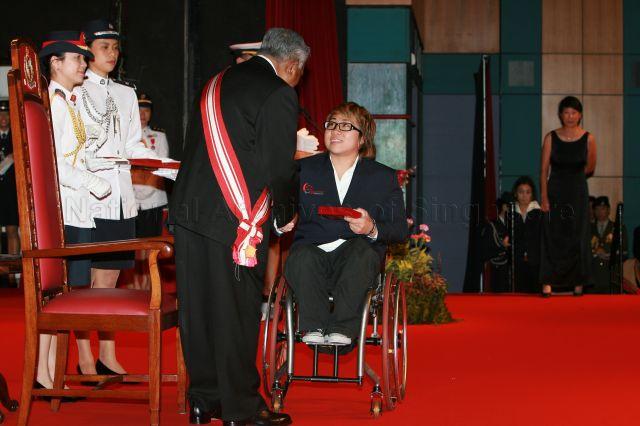 President S R Nathan presenting Public Service Medal to