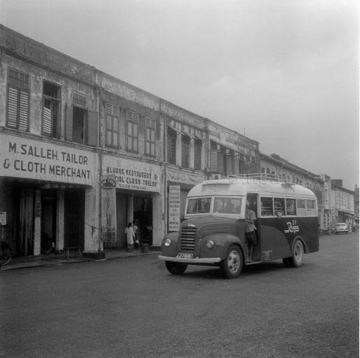 A RENGAM BUS COMPANY FORDSON THAMES IN STATION ROAD, KLUANG