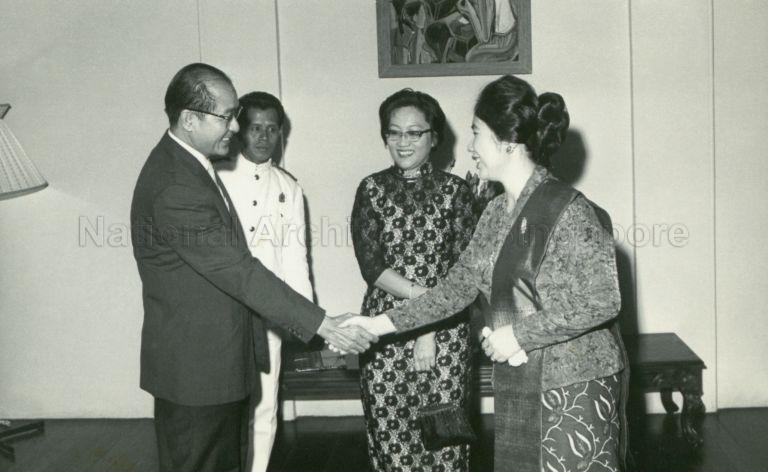 Puan Noor Aishah welcoming guests arriving for private