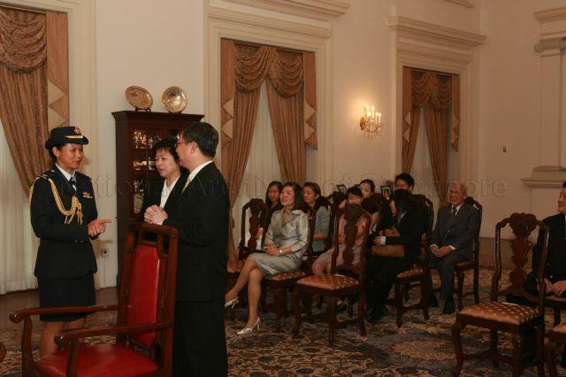 Standing, from right, Minister for Manpower Gan Kim Yong,