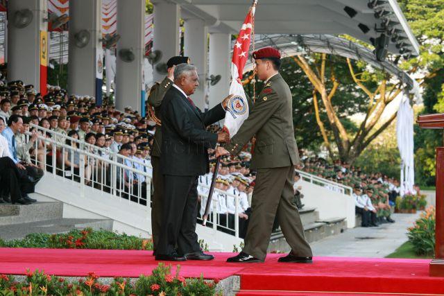 President S R Nathan presenting State Colours to Lieutenant